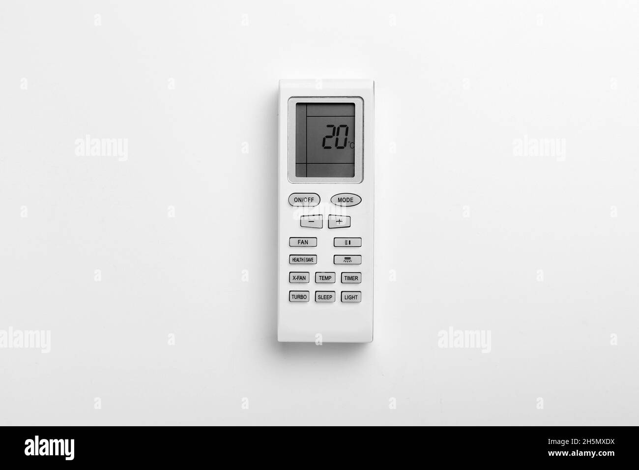 Air conditioning remote controller on white background Stock Photo - Alamy