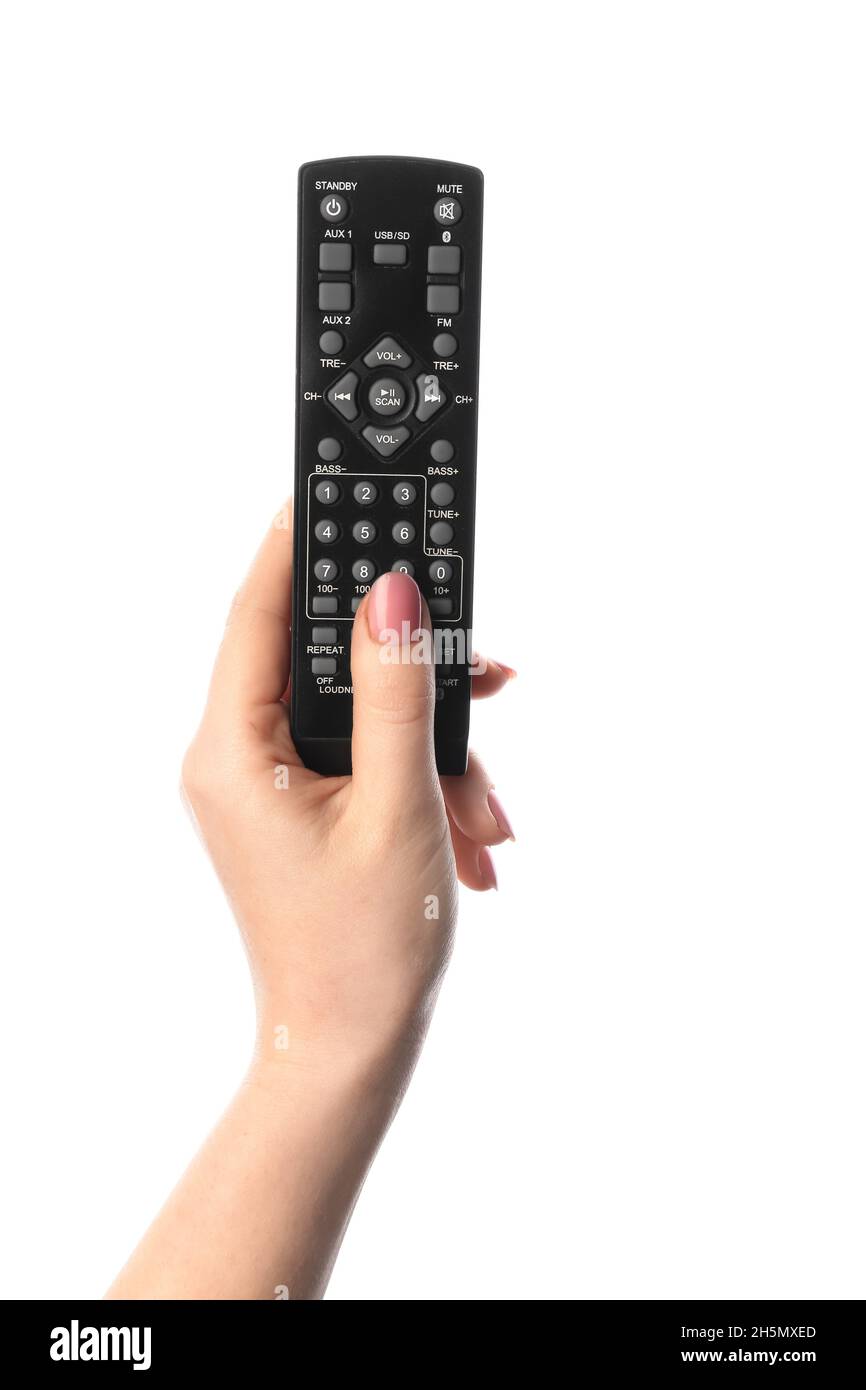 Female hand with TV remote controller on white background Stock Photo ...