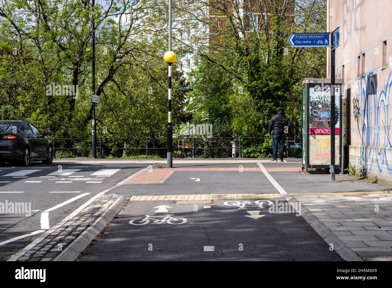 Wayfinding signs direct cyclists on a protected cycleway, the Filwood ...
