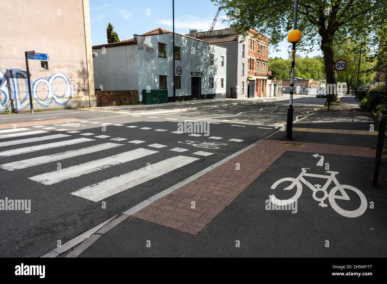 A protected cycle track and parallel zebra crossing form part of the ...