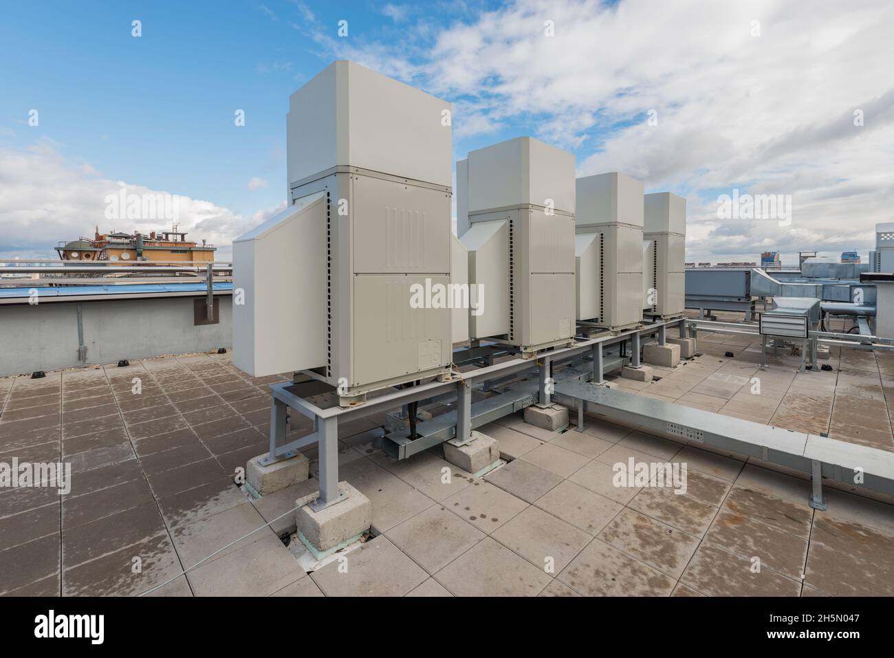 Air conditioning system assembled and installed on top of the building ...