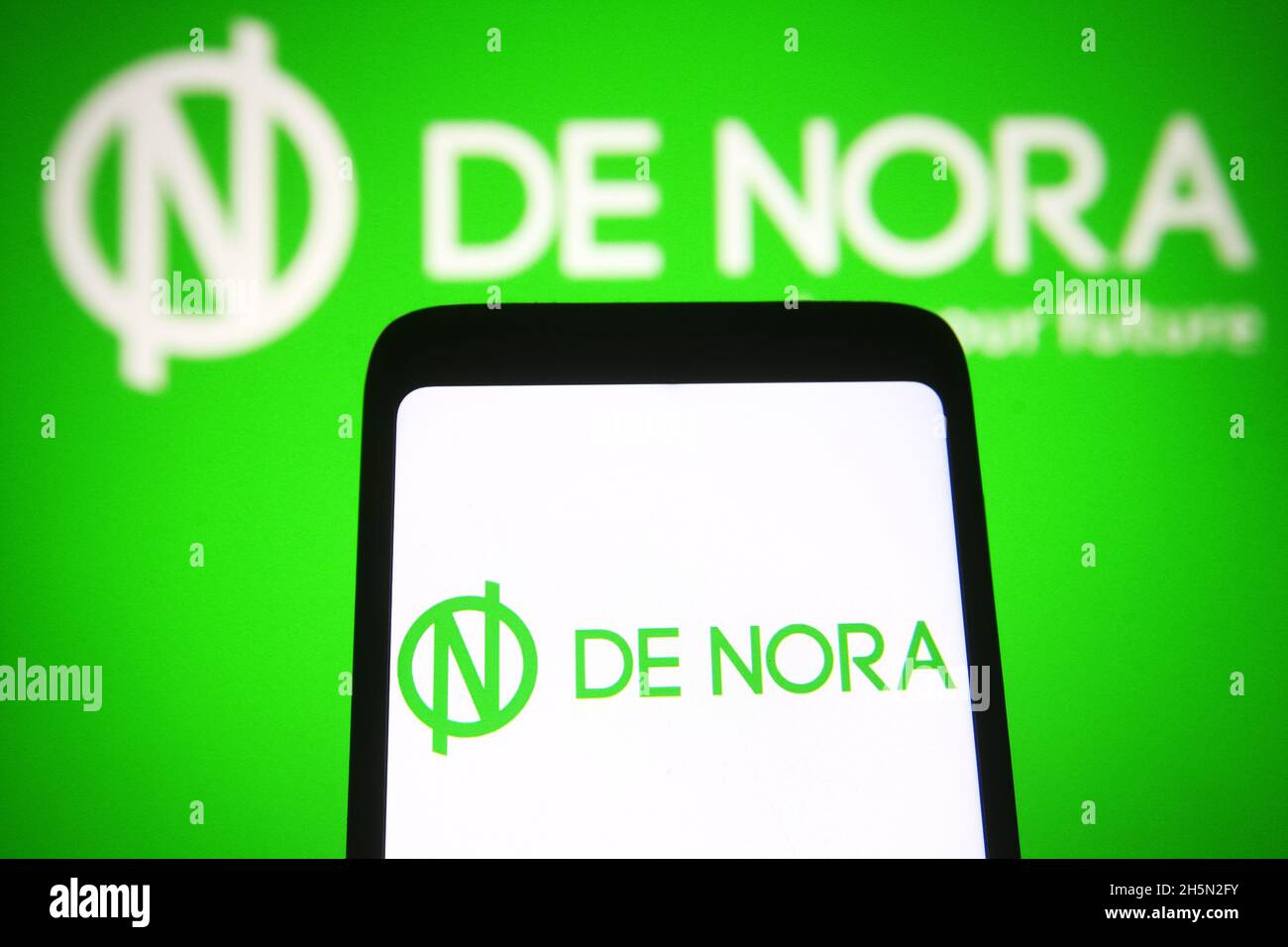 In this photo illustration, a De Nora S.p.A. logo is seen on a ...