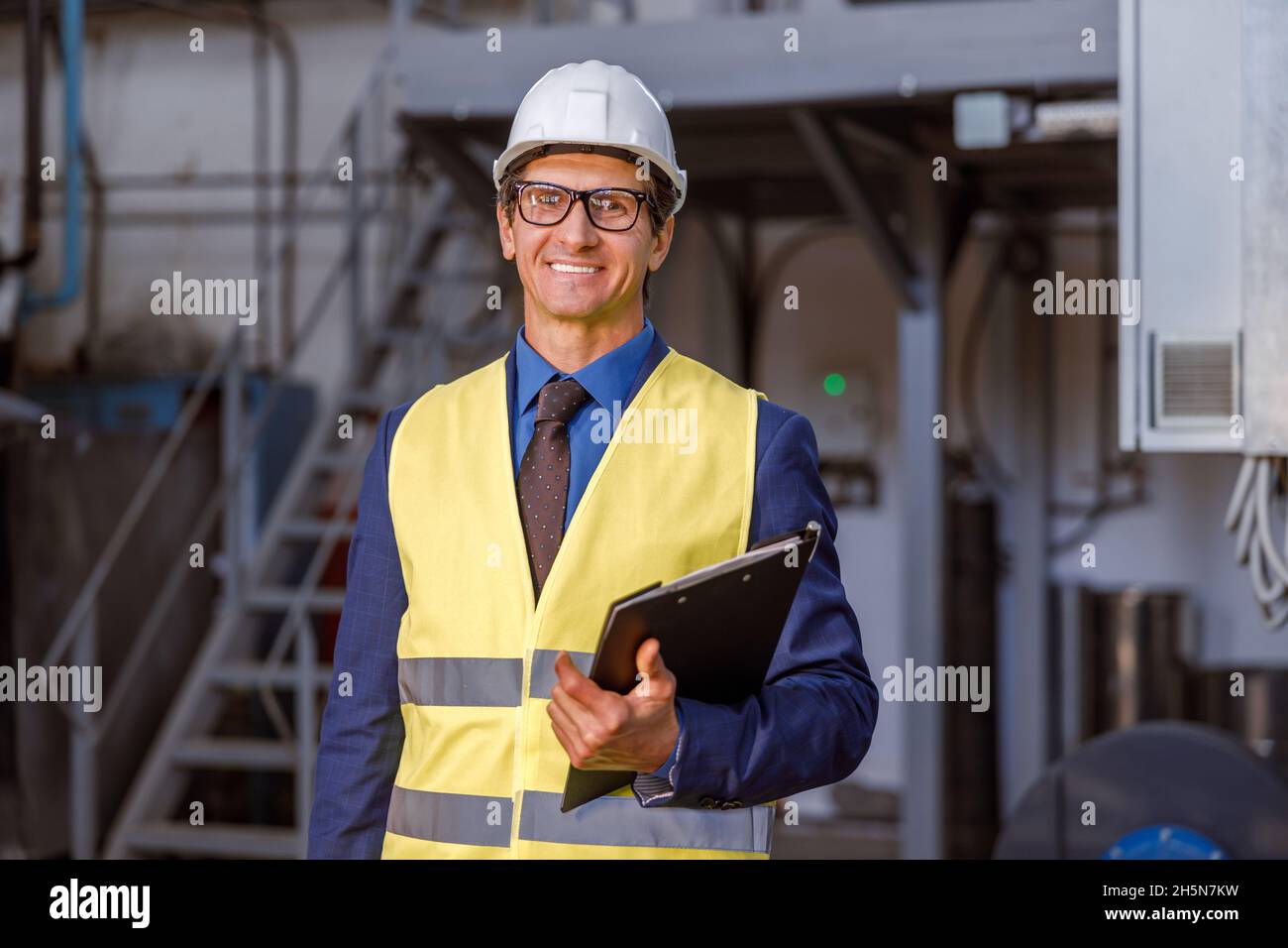 Cheerful man working documents hi-res stock photography and images - Alamy