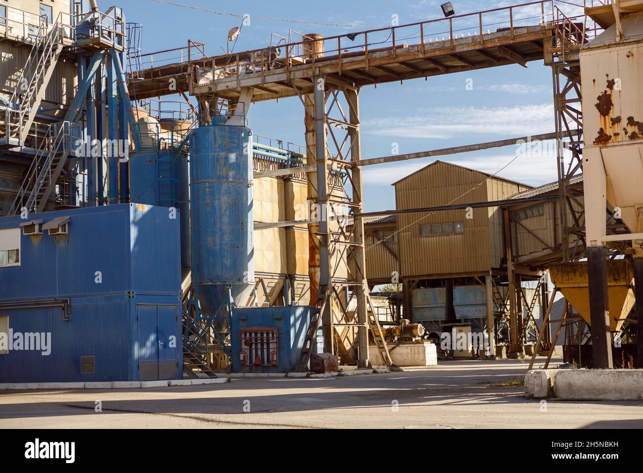 Factory with industrial buildings and heavy equipment Stock Photo - Alamy