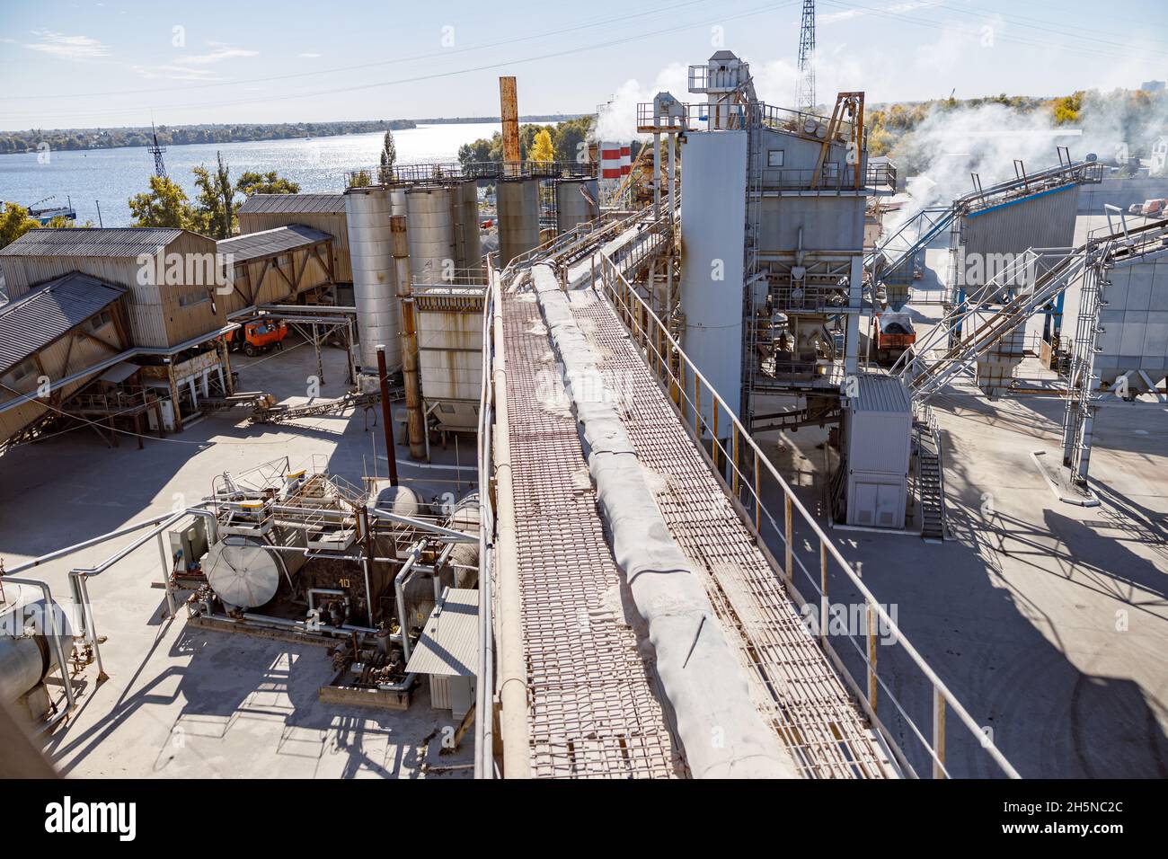 Manufacturing plant with industrial buildings and facility complex ...