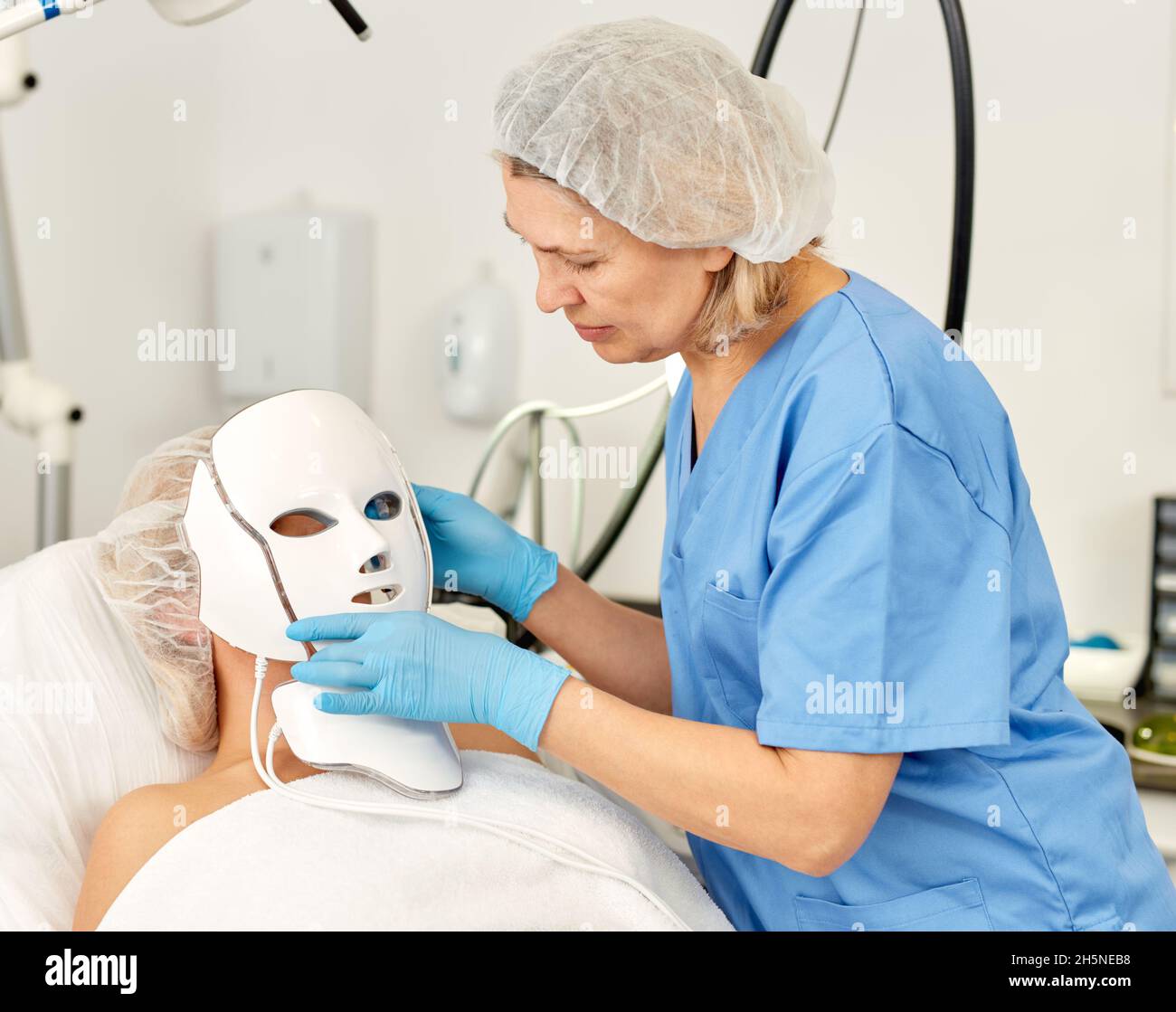 Girl expects plastic surgery in clinic Stock Photo - Alamy