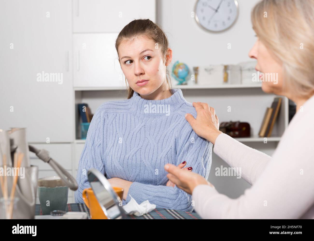 Senior mother lecturing her adult daughter Stock Photo - Alamy