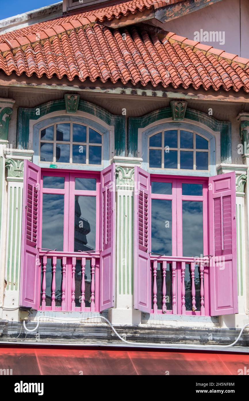 The colorful windows of the Islam style house in Arab street of ...