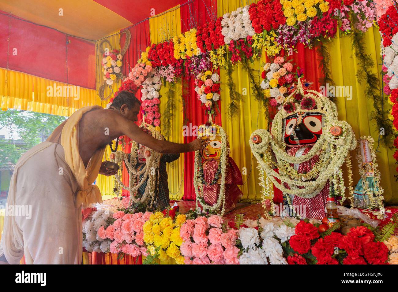 Howrah, West Bengal, India - 29th June 2020 : Hindu priest putting holy ...