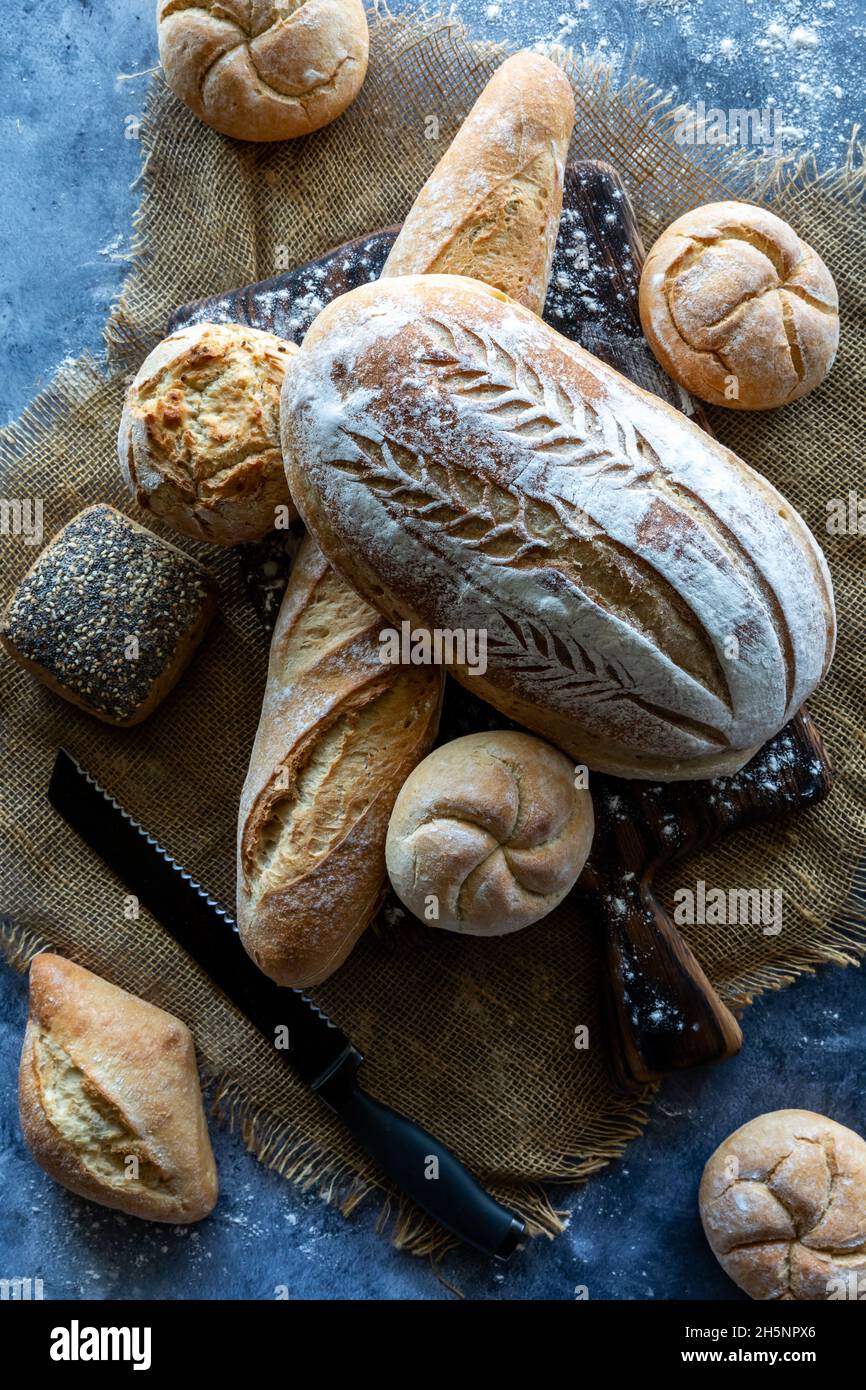 An assortment of sourdough bread and buns from above Stock Photo - Alamy