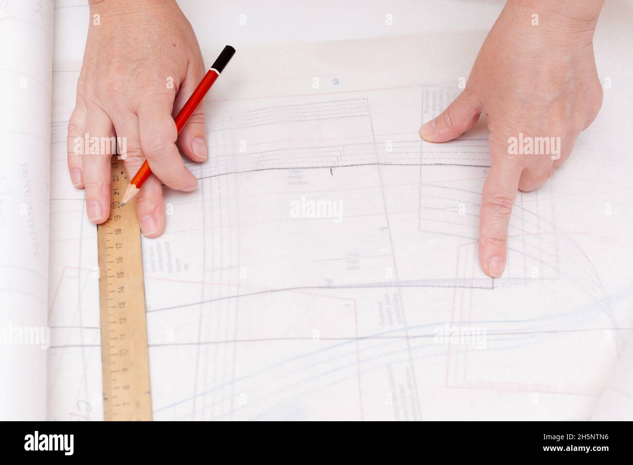 Female hands sewing on modern hi-res stock photography and images - Alamy