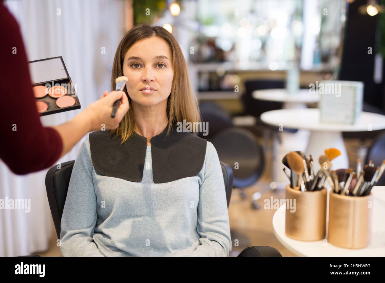 Woman blushing hands face hi-res stock photography and images - Alamy