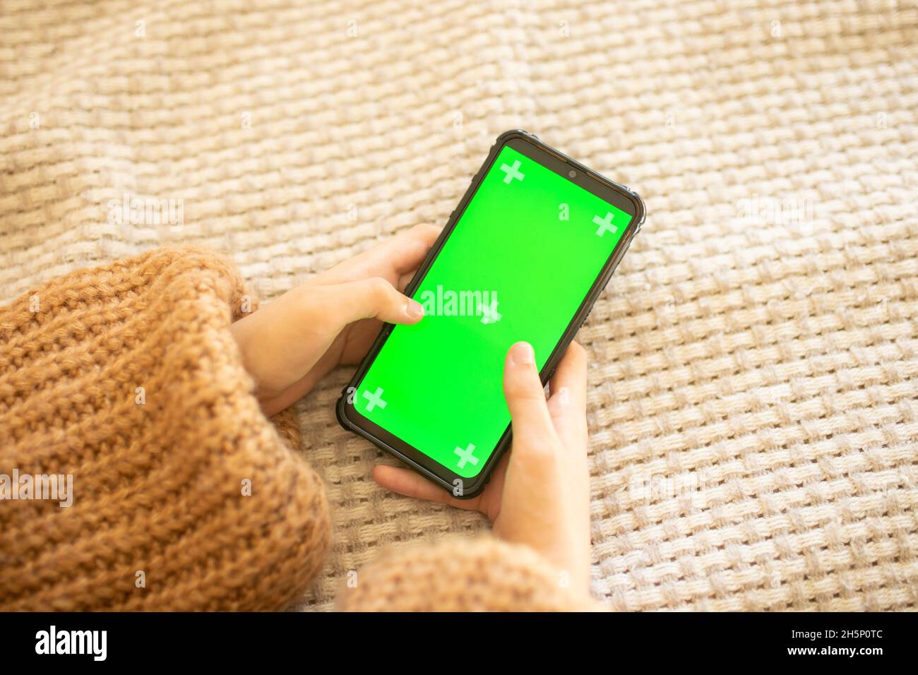Girl Using Smartphone with chroma key screen Stock Photo - Alamy