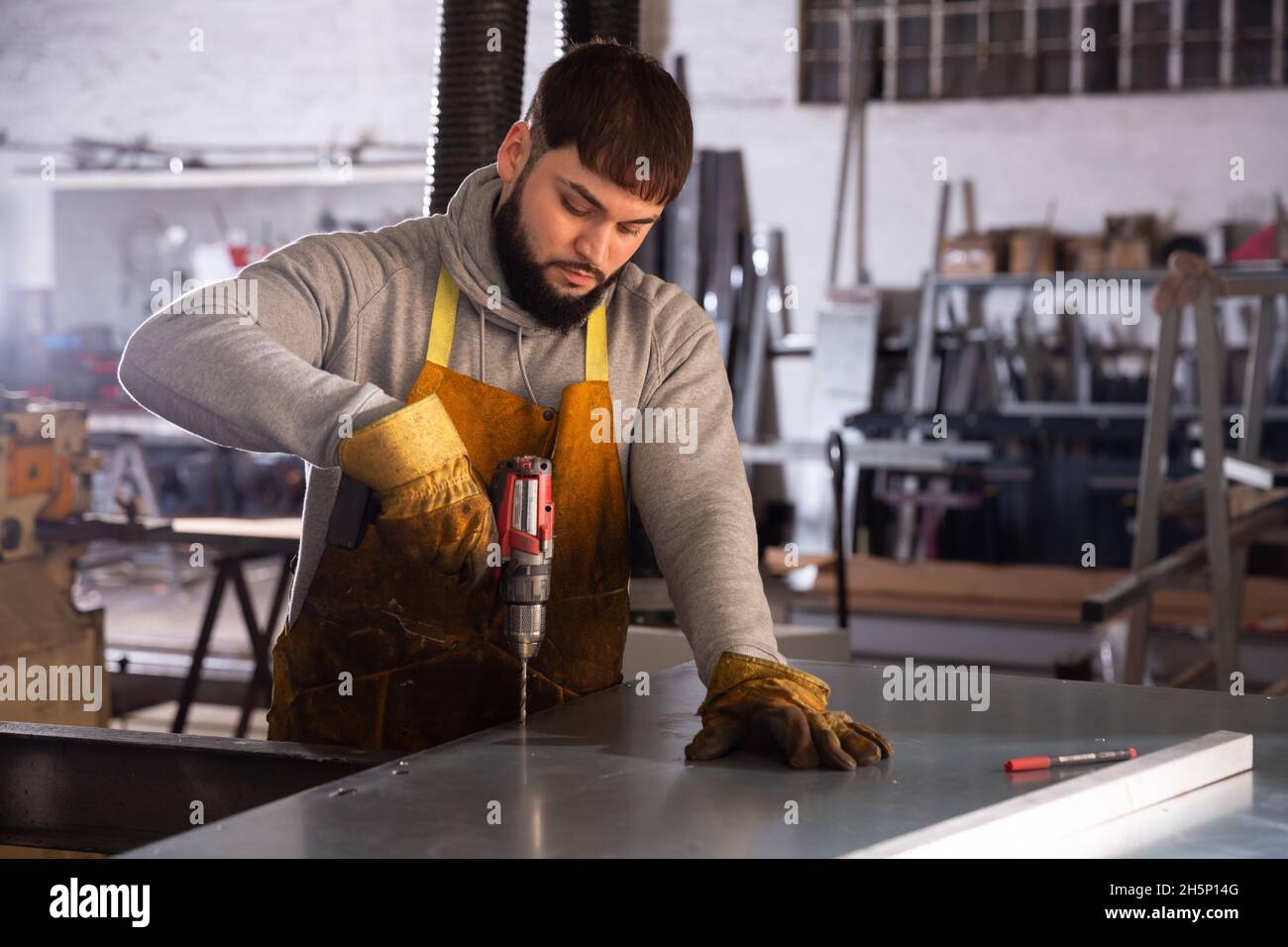 Hand holing metal device hi-res stock photography and images - Alamy