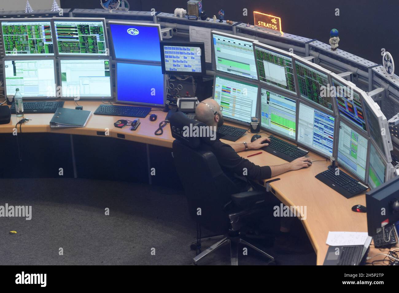 Oberpfaffenhofen, Germany. 11th Nov, 2021. A flight controller sits in ...