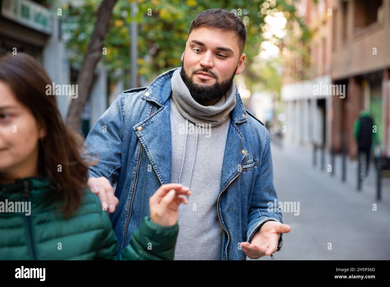 Man woman looking street turning hi-res stock photography and images ...