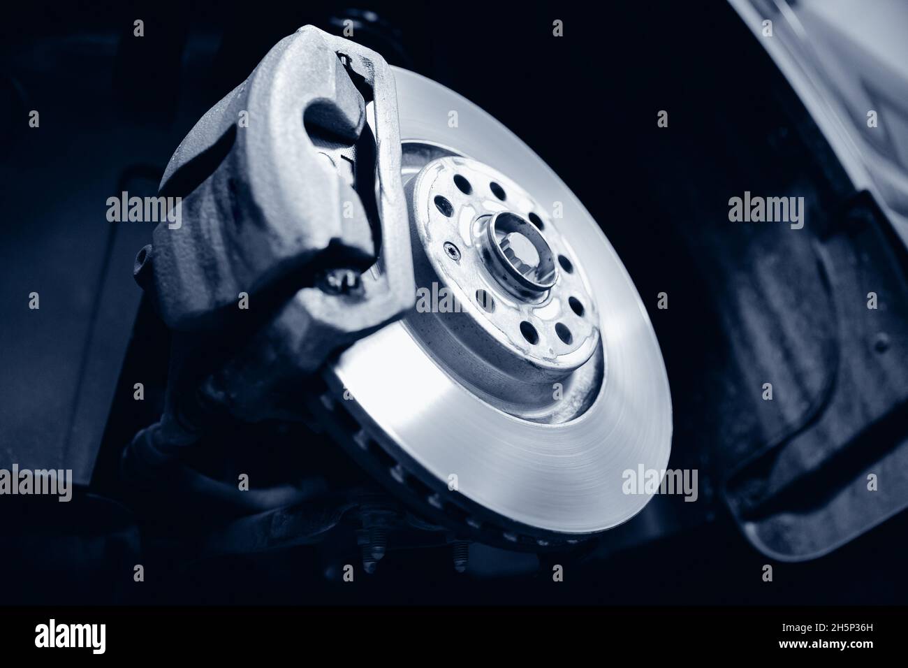 Closeup of steel brake disc in car service. Concept for replacing wheel ...