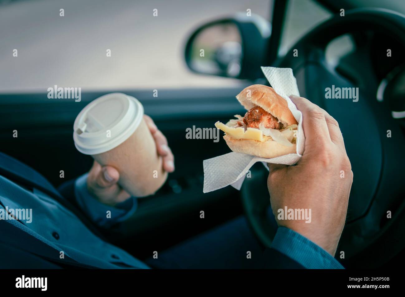Man eating dinner suit hi-res stock photography and images - Alamy