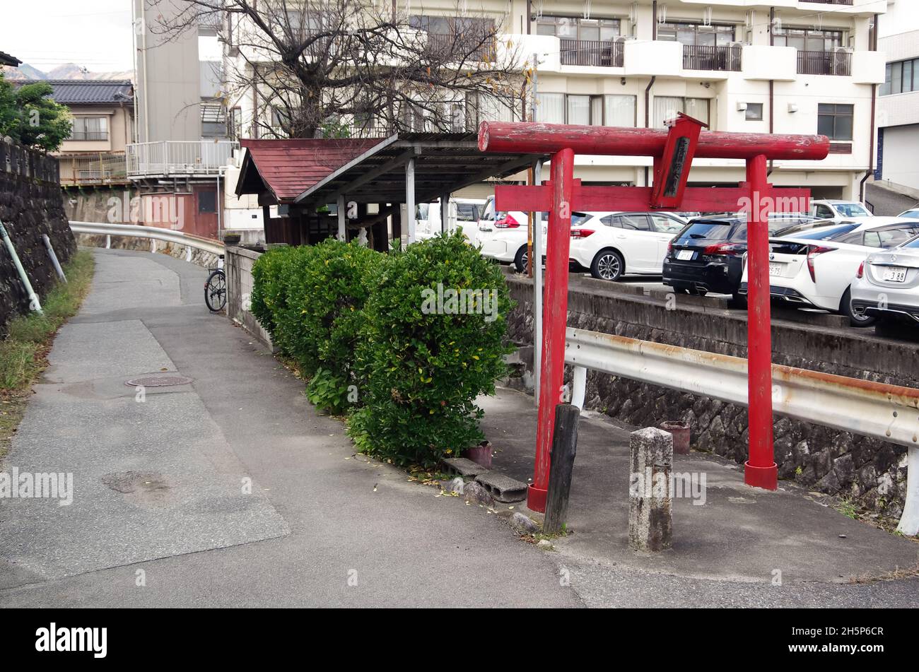 iida, nagano, japan 2021-11-11 , mini Shinto shrine on a side street ...