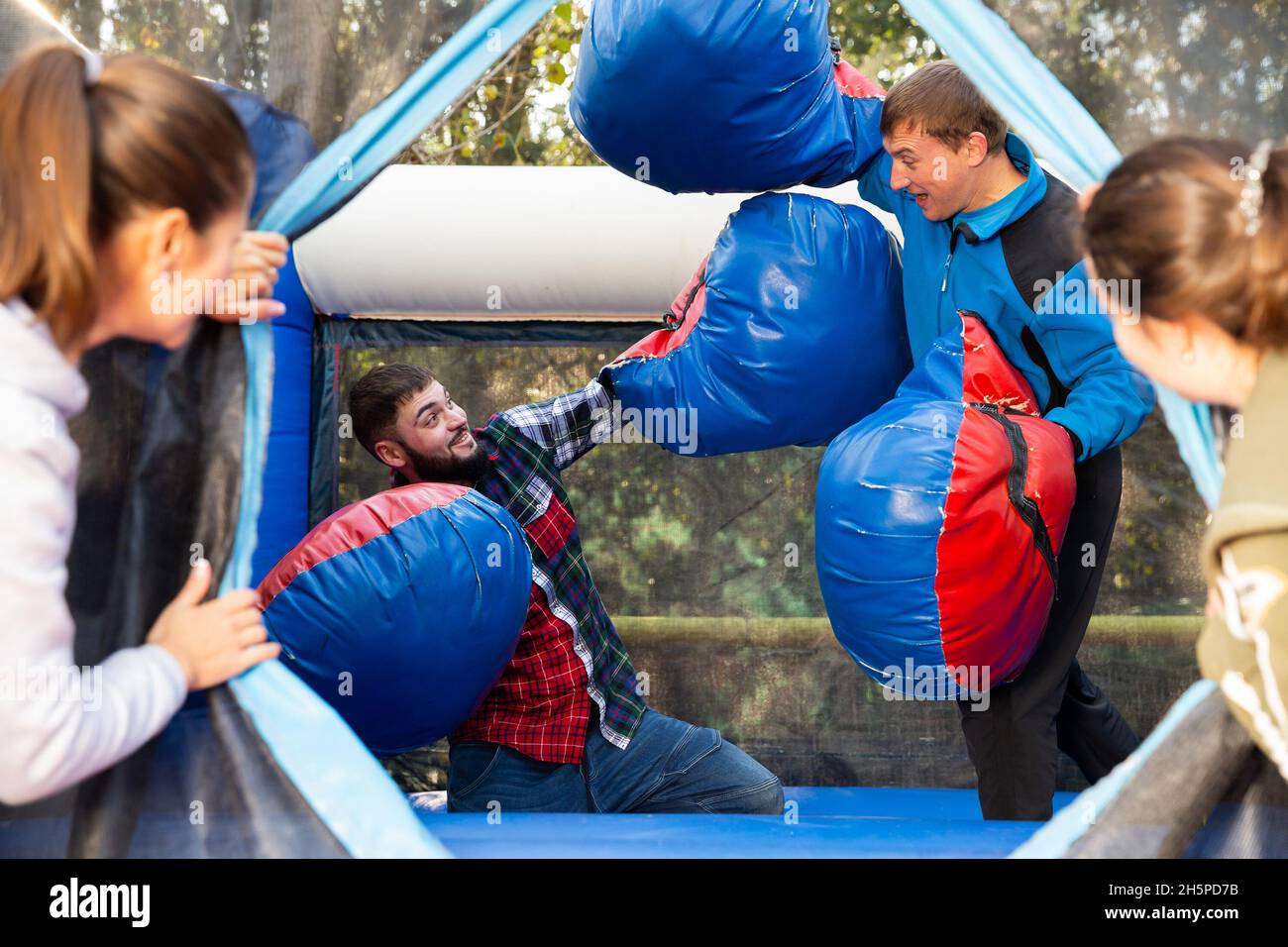 Two men having funny battle Stock Photo - Alamy