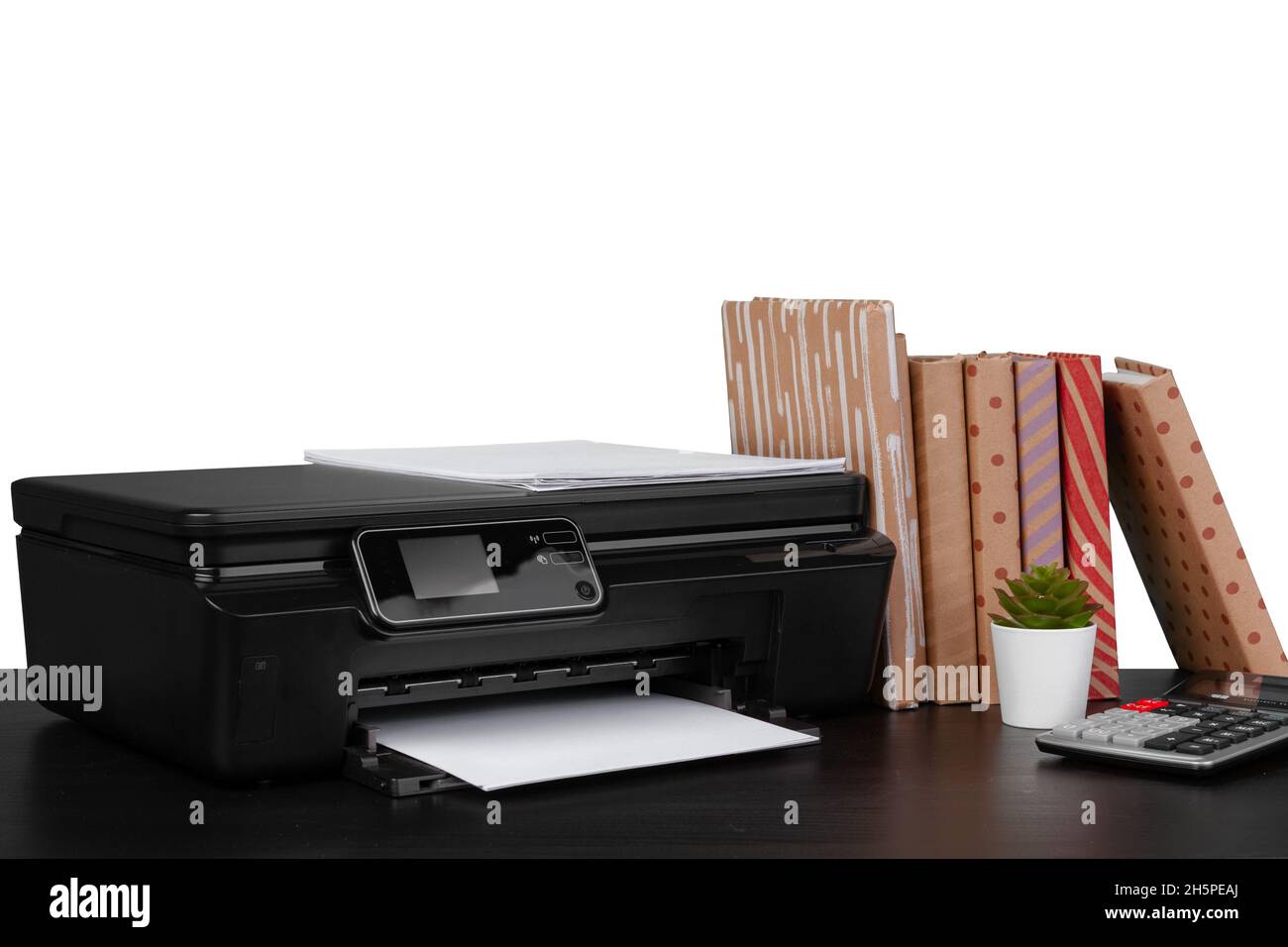 Office table with laser printer and books against white background ...