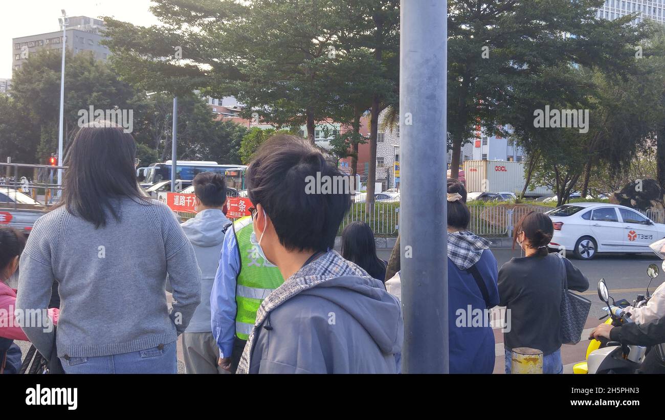 Shenzhen, China: traffic controllers maintain traffic order at traffic ...