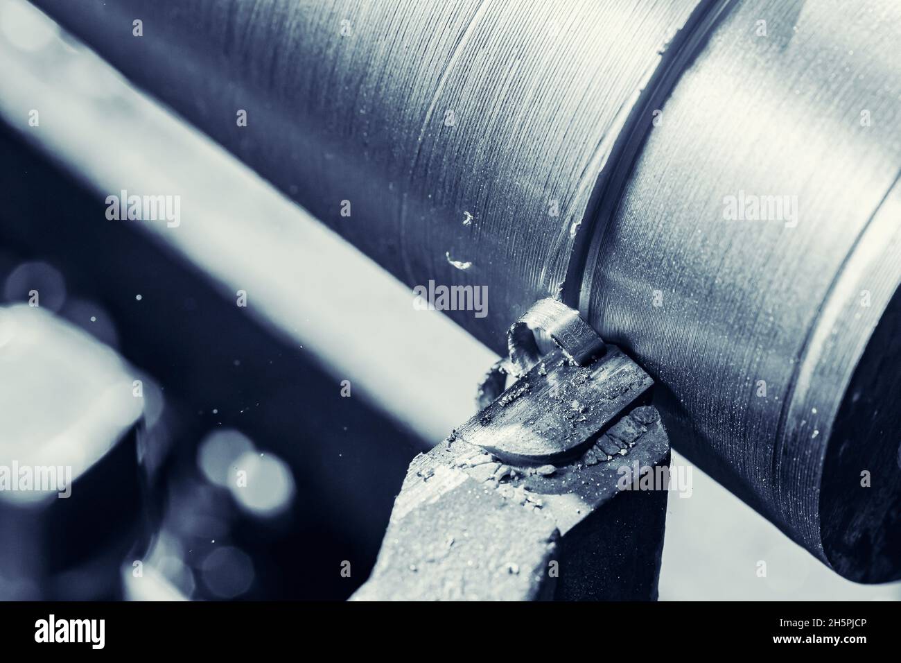 Process CNC lathe machine cutting metal. Modern industrial iron ...