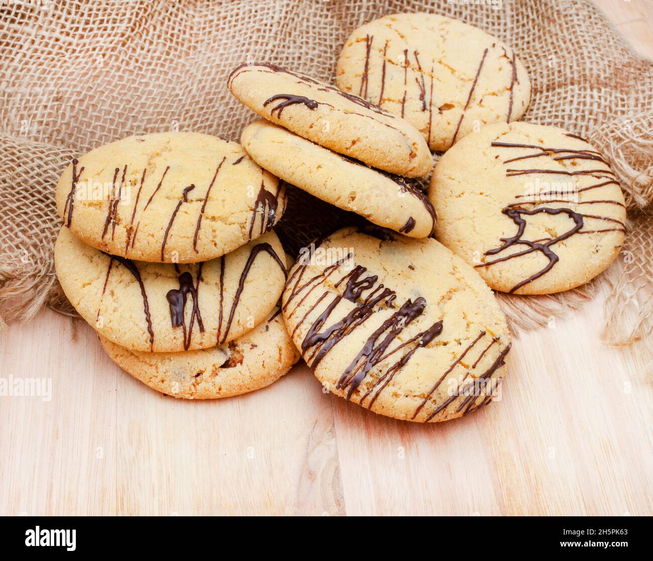 fresh chocolate chip butter biscuits on rustic table Stock Photo - Alamy