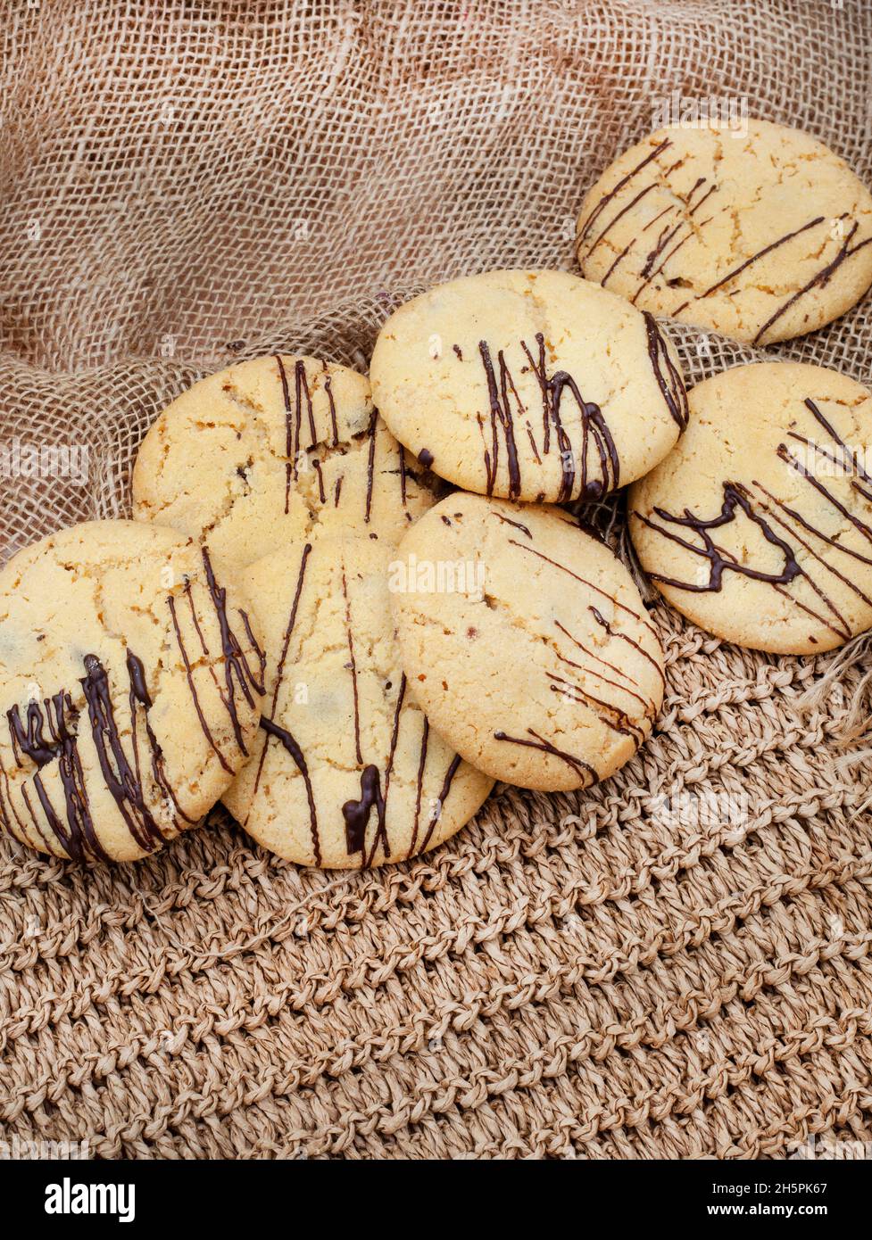 fresh chocolate chip butter biscuits on rustic table Stock Photo - Alamy