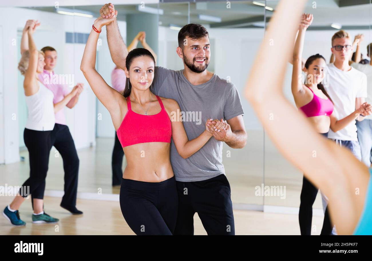 Friendly dancing pair dance tango together Stock Photo - Alamy