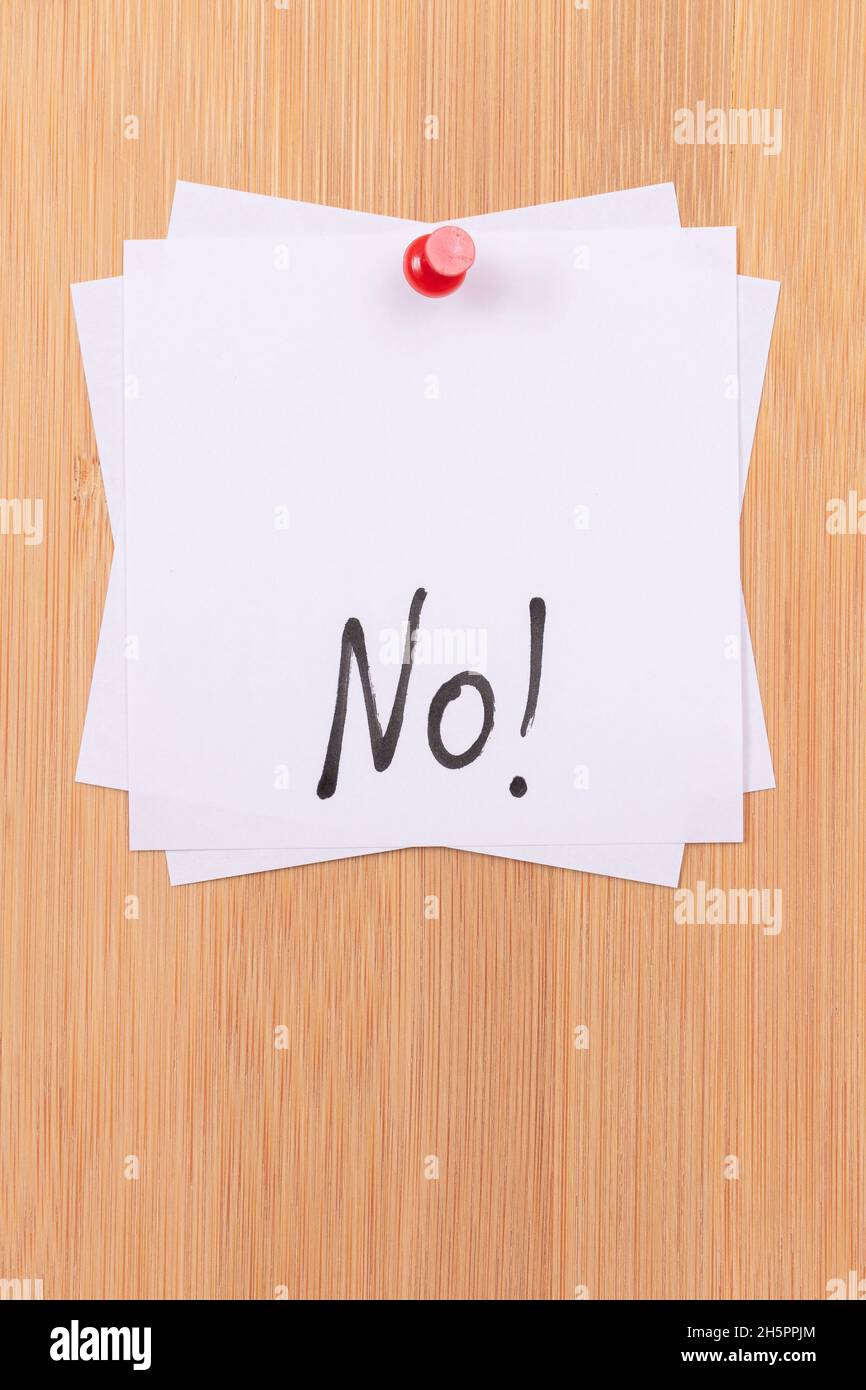 NO - White Sticky Notes with Written Word NO, Pinned to the Wooden ...
