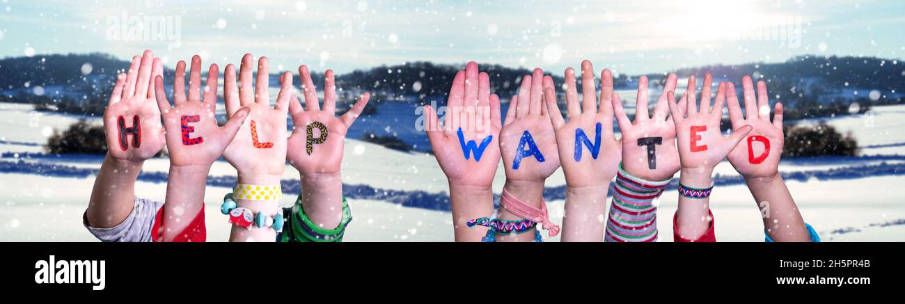 Children Hands Building Word Help Wanted, Snowy Winter Background Stock ...
