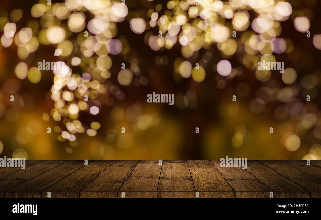 Bokeh background with empty wooden deck table for product montage ...