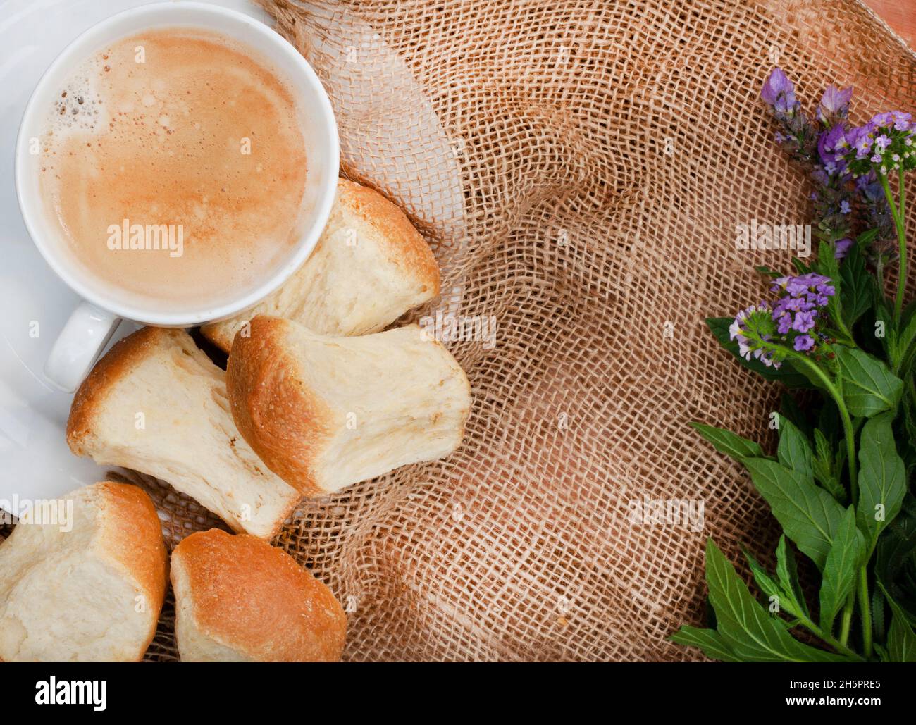 coffee and fresh traditional South African Rusks on rustic table Stock ...