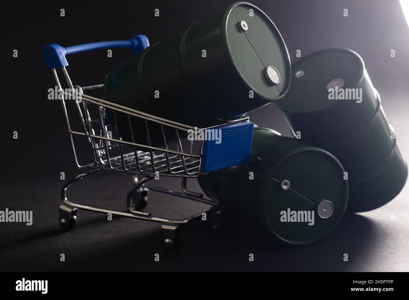 Miniatures toy barrels on a shopping cart Stock Photo - Alamy