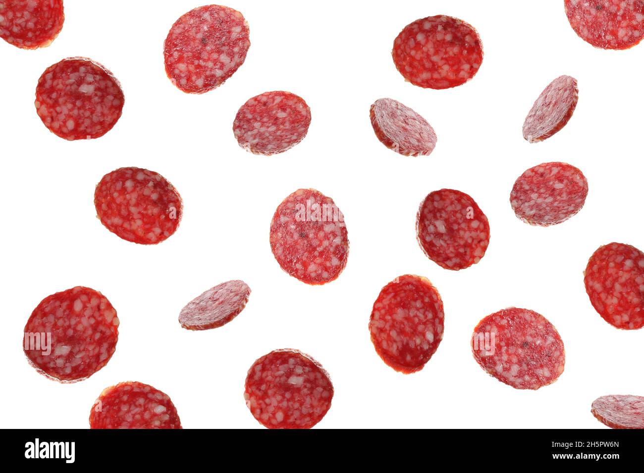 Falling salami sausage isolated on white background Stock Photo - Alamy