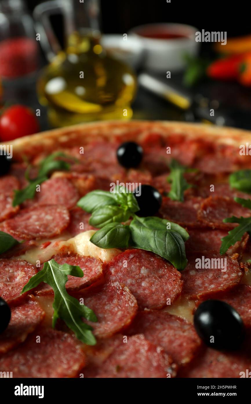 Concept of tasty food with Salami pizza, close up Stock Photo - Alamy