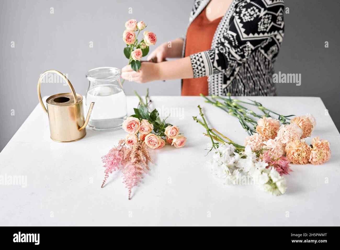 Step by step installation of flowers in a vase. Flowers bunch, set for ...