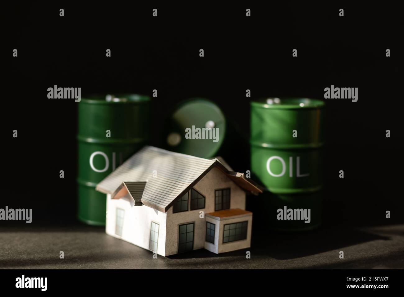 tin barrels and house mockup Stock Photo - Alamy