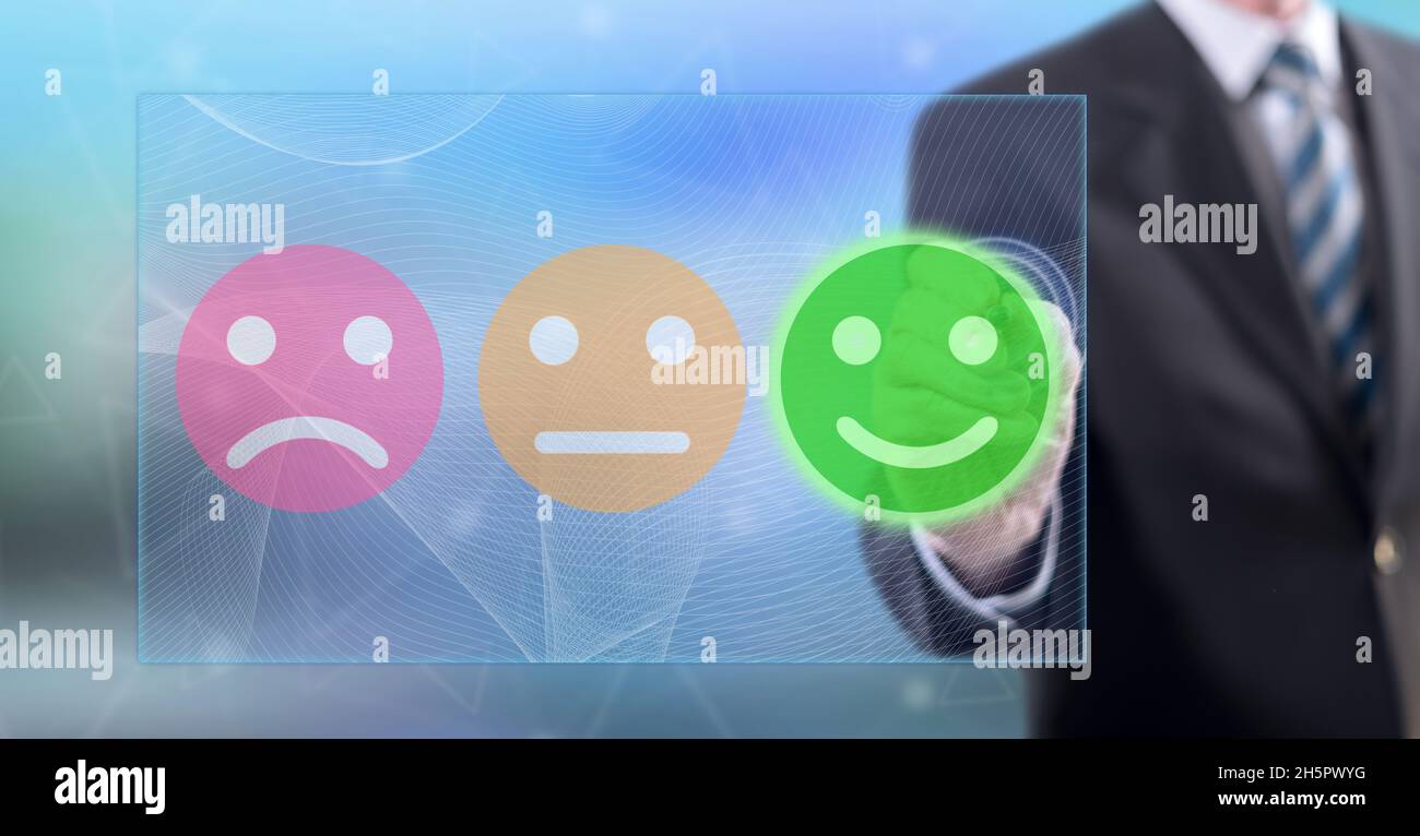 Man touching a customer satisfaction concept on a touch screen with a ...