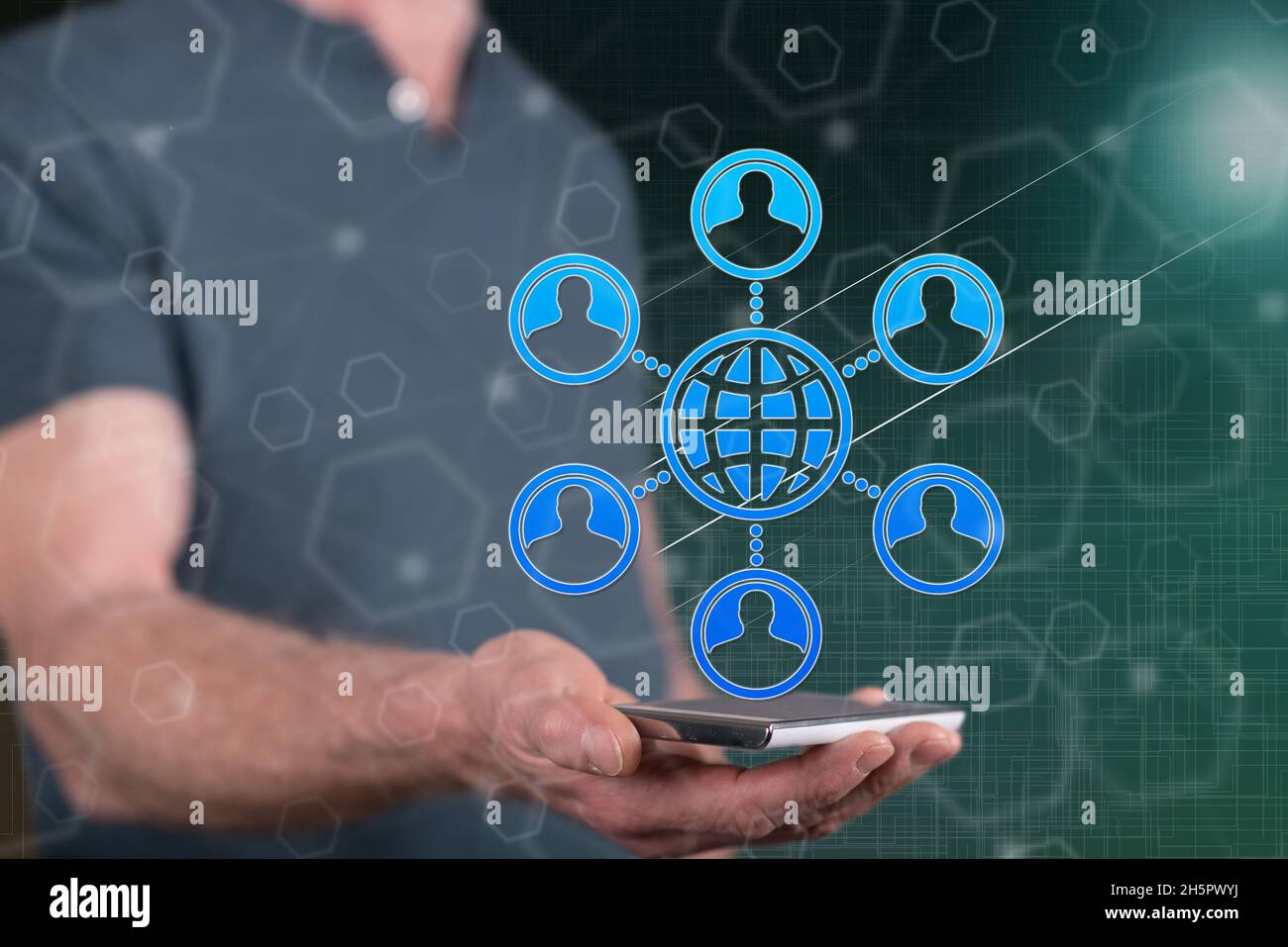 Globalization concept above a smartphone held by a man in background ...