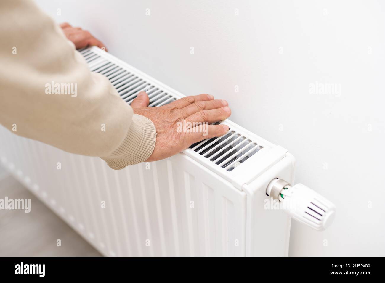 Elderly cold radiator hi-res stock photography and images - Alamy
