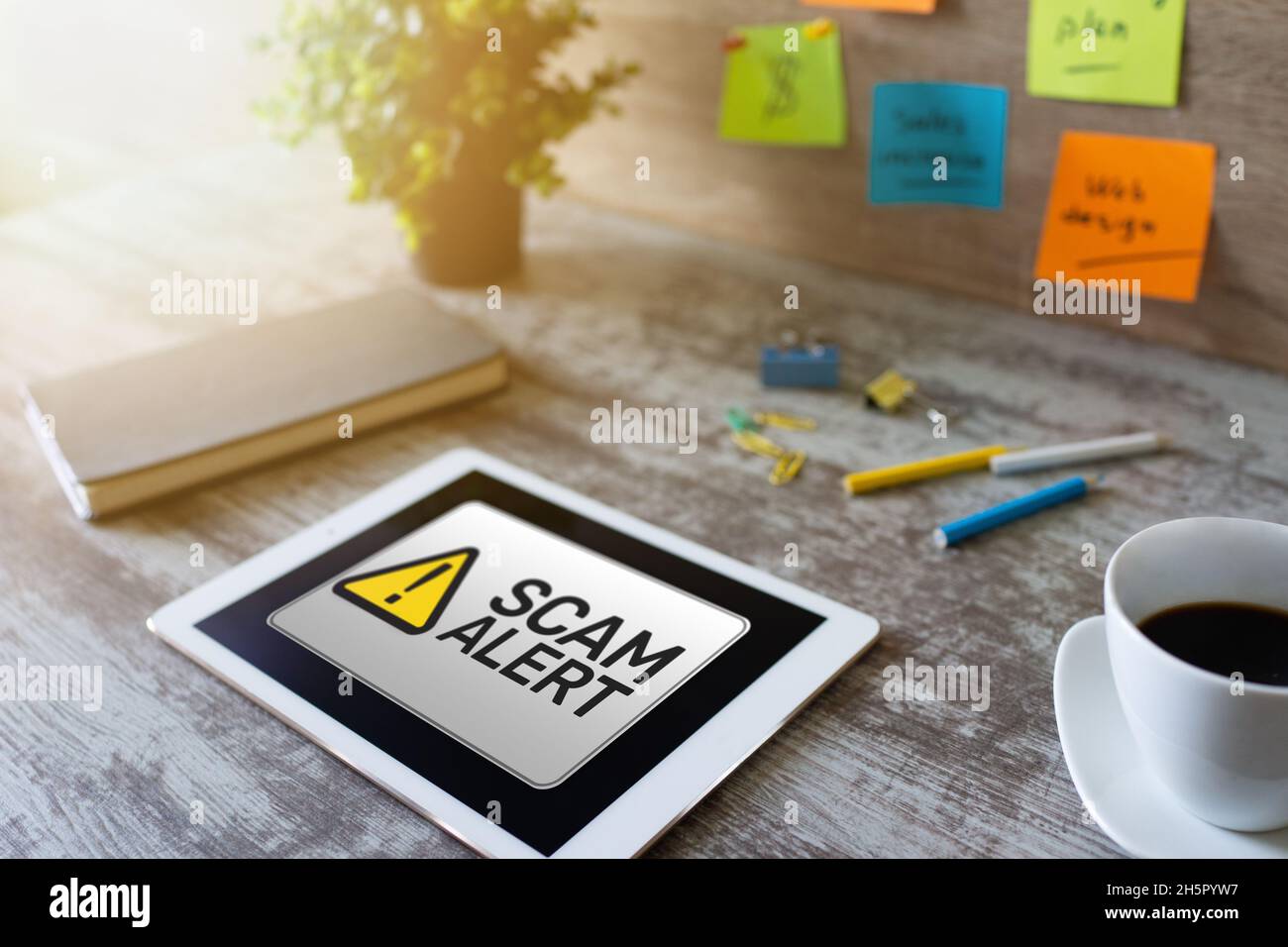 Scam alert detecting warning. Notification on device screen Stock Photo ...