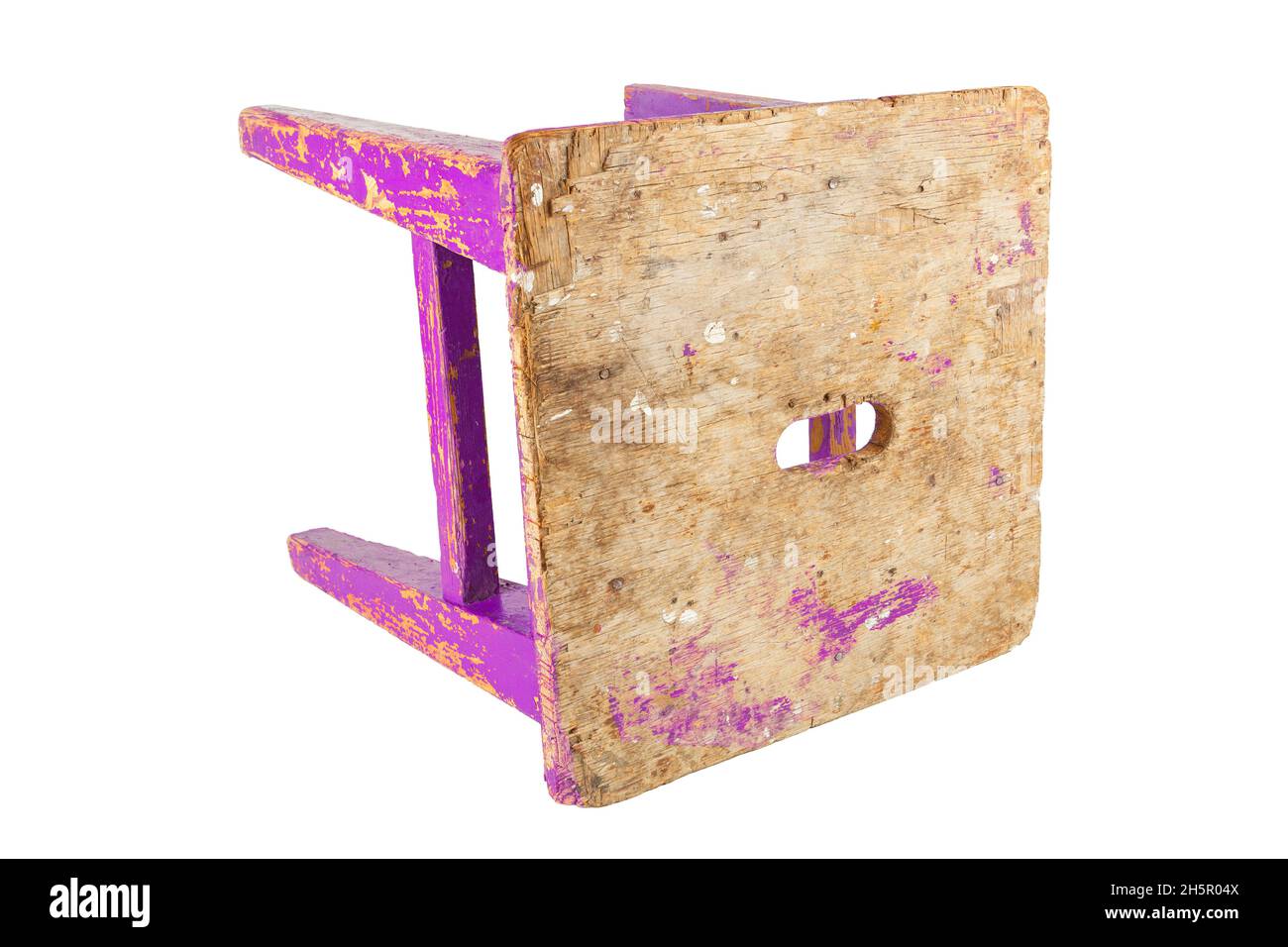 Old wooden stool with peeling pink paint. Loft style chair isolated on ...