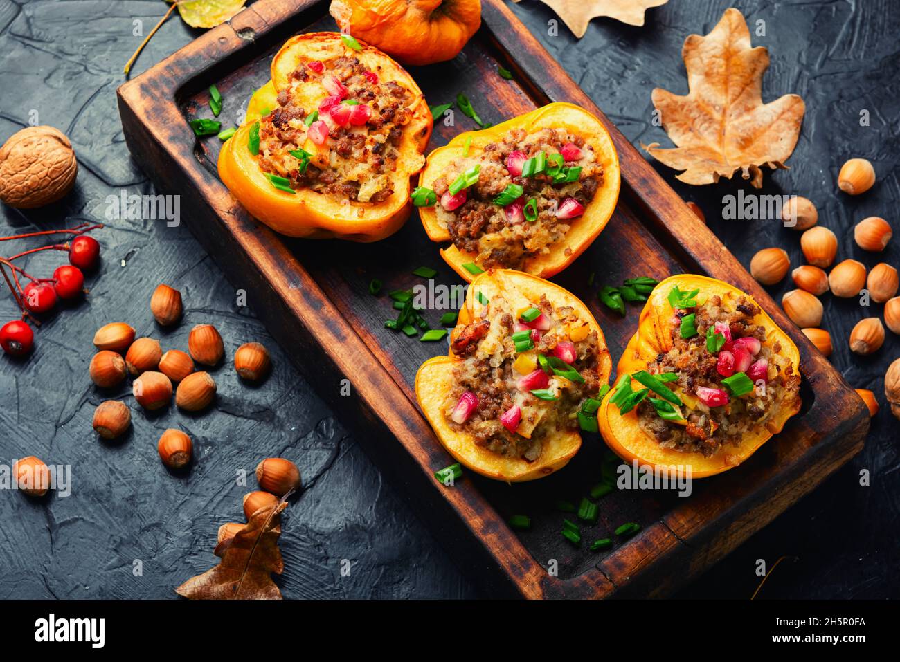 Apple stuffed with minced meat. Appetizing autumn recipe Stock Photo ...