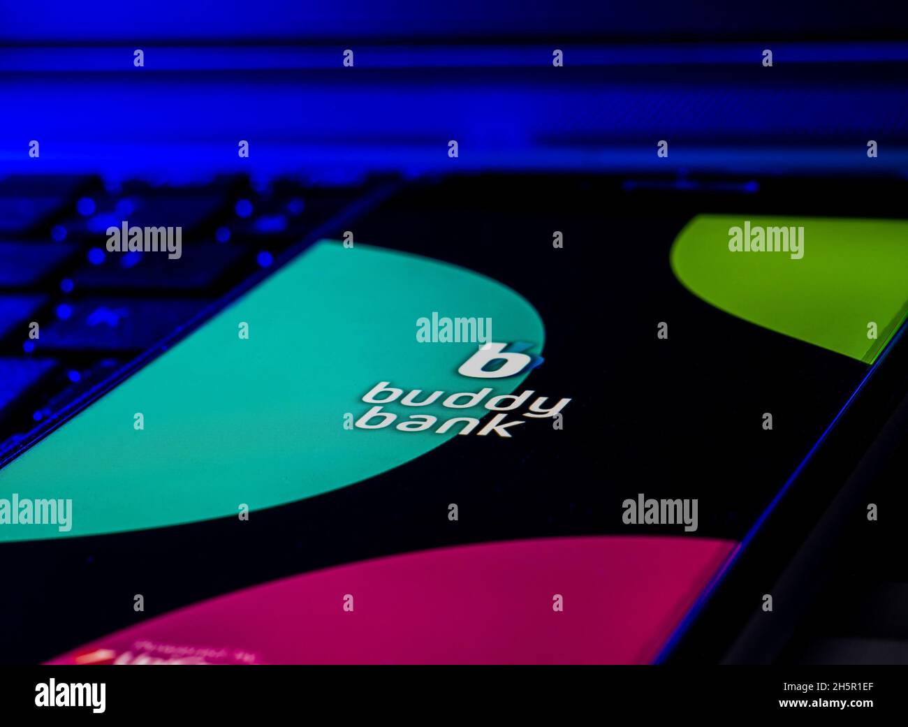 smartphone on a computer keyboard with the Buddy Bank app logo Stock ...