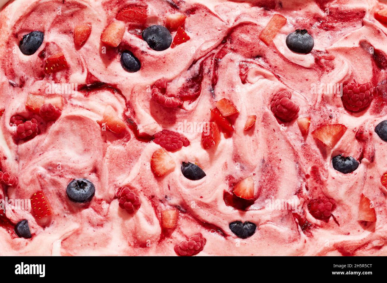 Gourmet speciality creamy mixed berry ice cream with raspberry ...