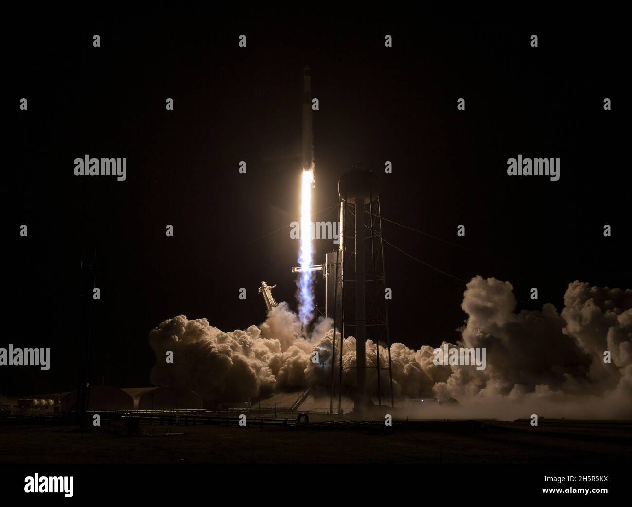 A SpaceX Falcon 9 rocket carrying the company's Crew Dragon spacecraft ...