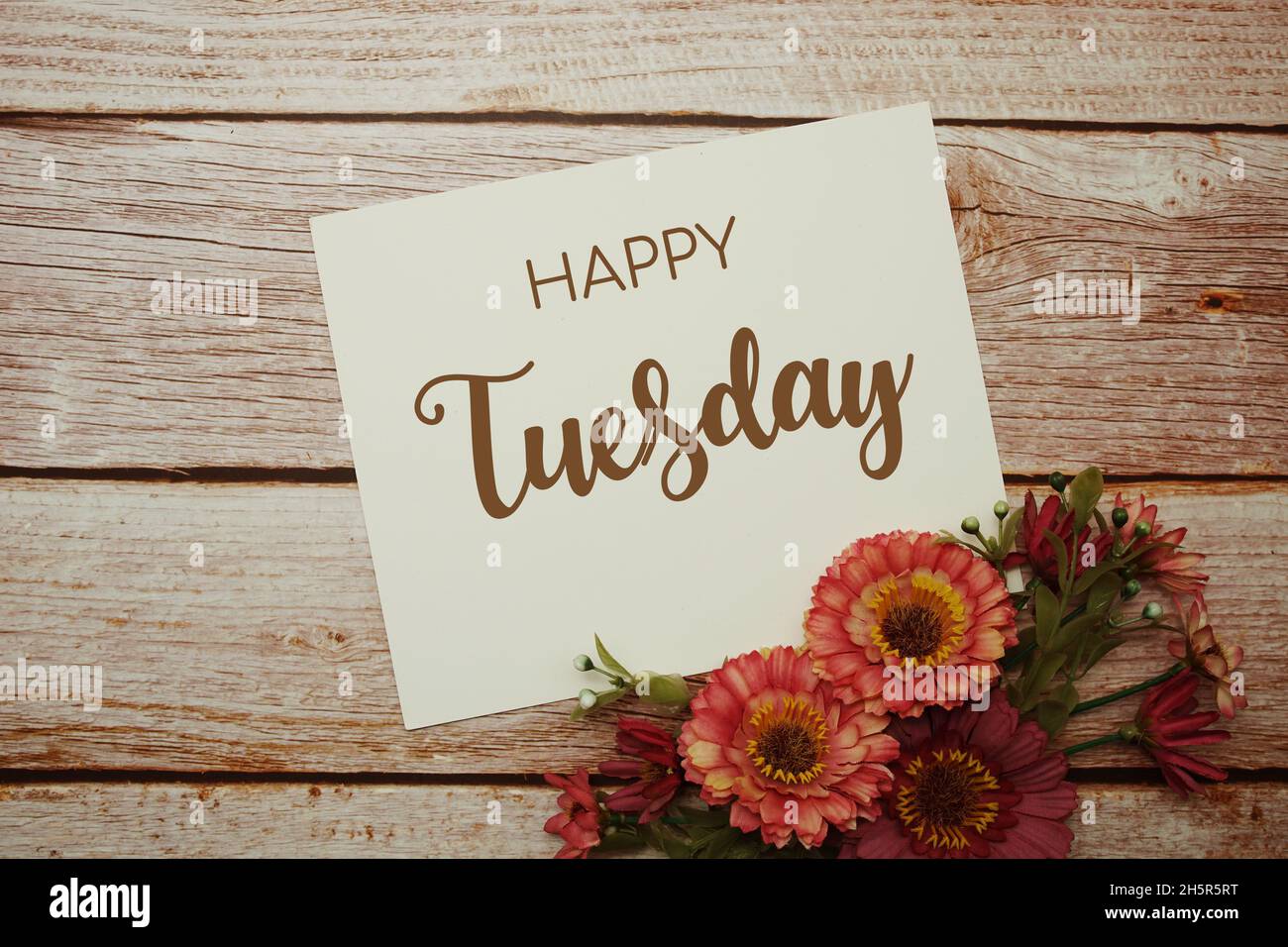 Happy Tuesday card typography text with flower bouquet on wooden ...