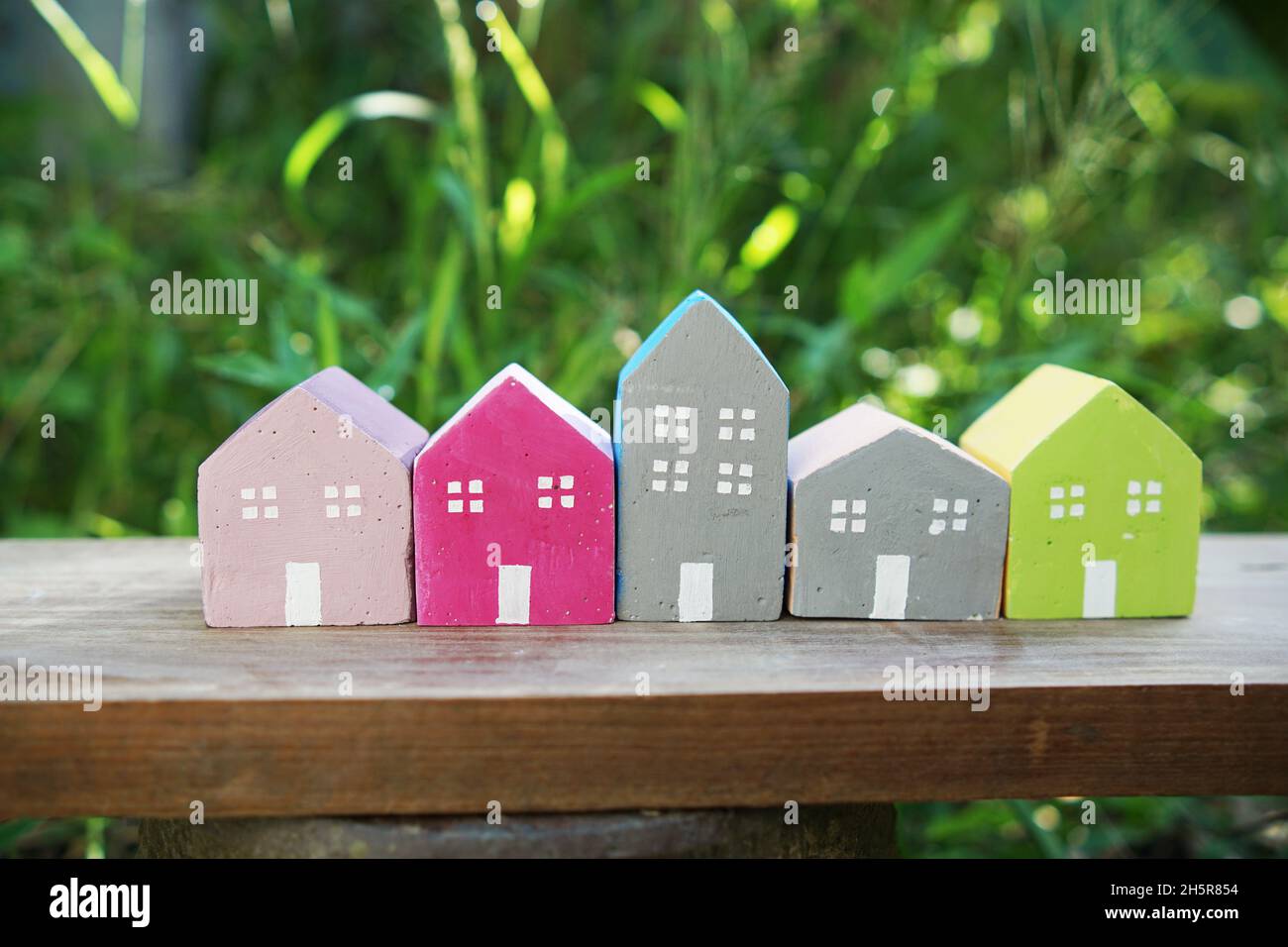 Colorful Miniature little houses village Home and Real Estate concept ...